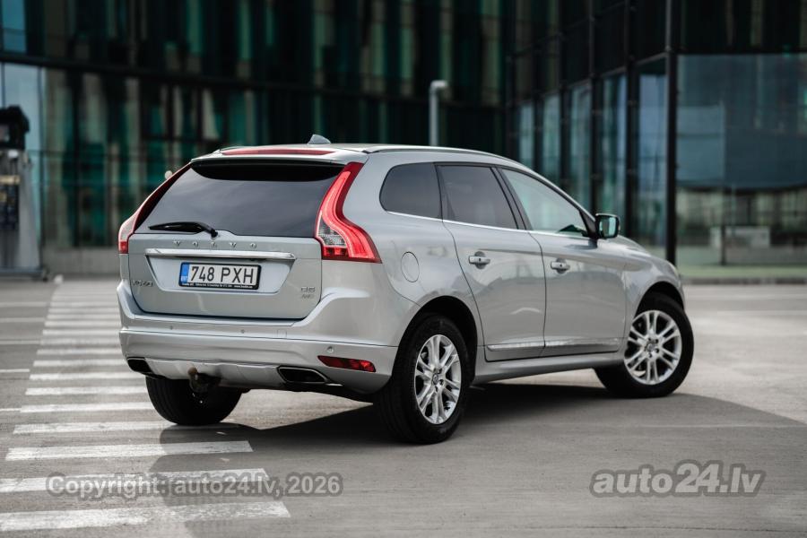 Grey Volvo XC60 2014 in Tallinn, with an engine capacity of 2.40 L and mileage of 325 thousand km for 10999 €, photo 6 on AUTOMOTO.COM.LV