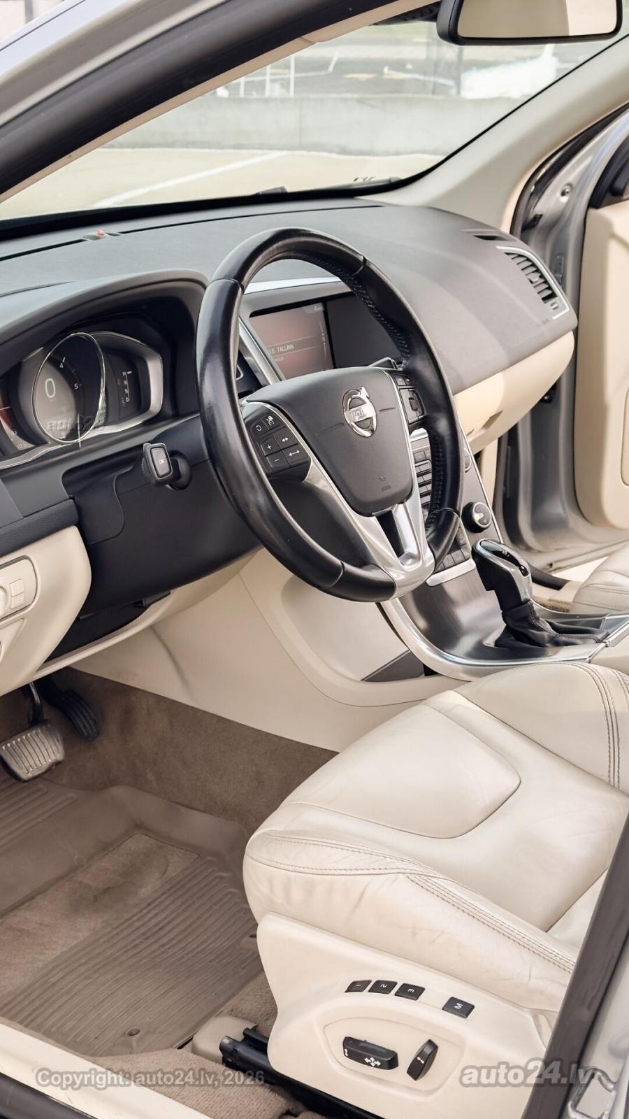 Grey Volvo XC60 2014 in Tallinn, with an engine capacity of 2.40 L and mileage of 325 thousand km for 10999 €, photo 9 on AUTOMOTO.COM.LV