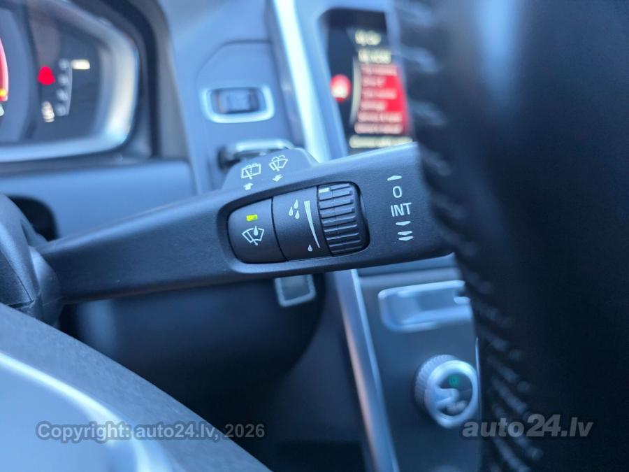 Grey Volvo XC60 2014 in Tallinn, with an engine capacity of 2.00 L and mileage of 187 thousand km for 11990 €, photo 21 on AUTOMOTO.COM.LV