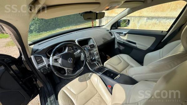Grey Volvo XC60 2014 in Tukums, with an engine capacity of 2.00 L and mileage of 330 thousand km for 6999 €, photo 5 on AUTOMOTO.COM.LV
