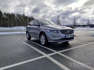 Grey Volvo XC60 2014 in Riga, with an engine capacity of 2.00 L and mileage of 237 thousand km for 12250 €, photo 3 on AUTOMOTO.COM.LV