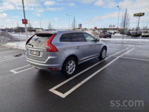 Grey Volvo XC60 2014 in Riga, with an engine capacity of 2.00 L and mileage of 237 thousand km for 12250 €, photo 4 on AUTOMOTO.COM.LV