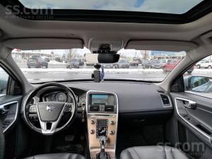 Grey Volvo XC60 2014 in Riga, with an engine capacity of 2.00 L and mileage of 237 thousand km for 12250 €, photo 9 on AUTOMOTO.COM.LV