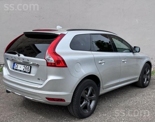 Grey Volvo XC60 2014 in Riga, with an engine capacity of 2.00 L and mileage of 204 thousand km for 8350 €, photo 5 on AUTOMOTO.COM.LV