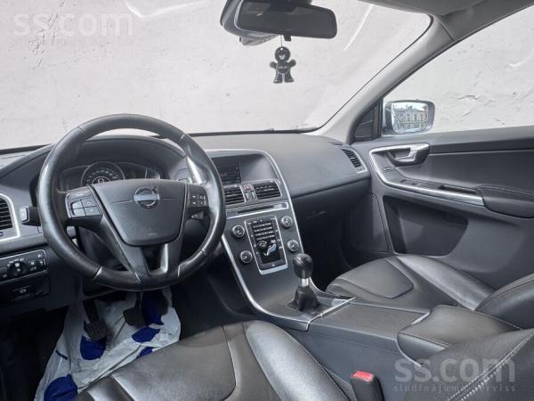 Grey Volvo XC60 2014 in Riga, with an engine capacity of 2.00 L and mileage of 204 thousand km for 8350 €, photo 7 on AUTOMOTO.COM.LV