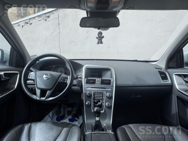 Grey Volvo XC60 2014 in Riga, with an engine capacity of 2.00 L and mileage of 204 thousand km for 8350 €, photo 8 on AUTOMOTO.COM.LV