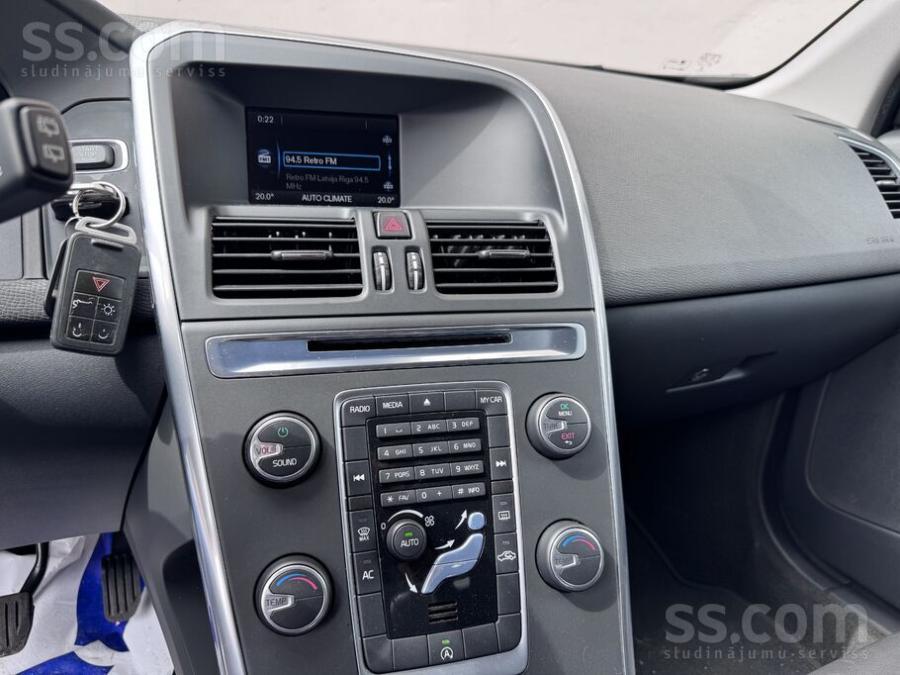 Grey Volvo XC60 2014 in Riga, with an engine capacity of 2.00 L and mileage of 204 thousand km for 8350 €, photo 12 on AUTOMOTO.COM.LV