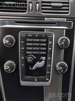 Grey Volvo XC60 2014 in Riga, with an engine capacity of 2.00 L and mileage of 316 thousand km for 8990 €, photo 18 on AUTOMOTO.COM.LV