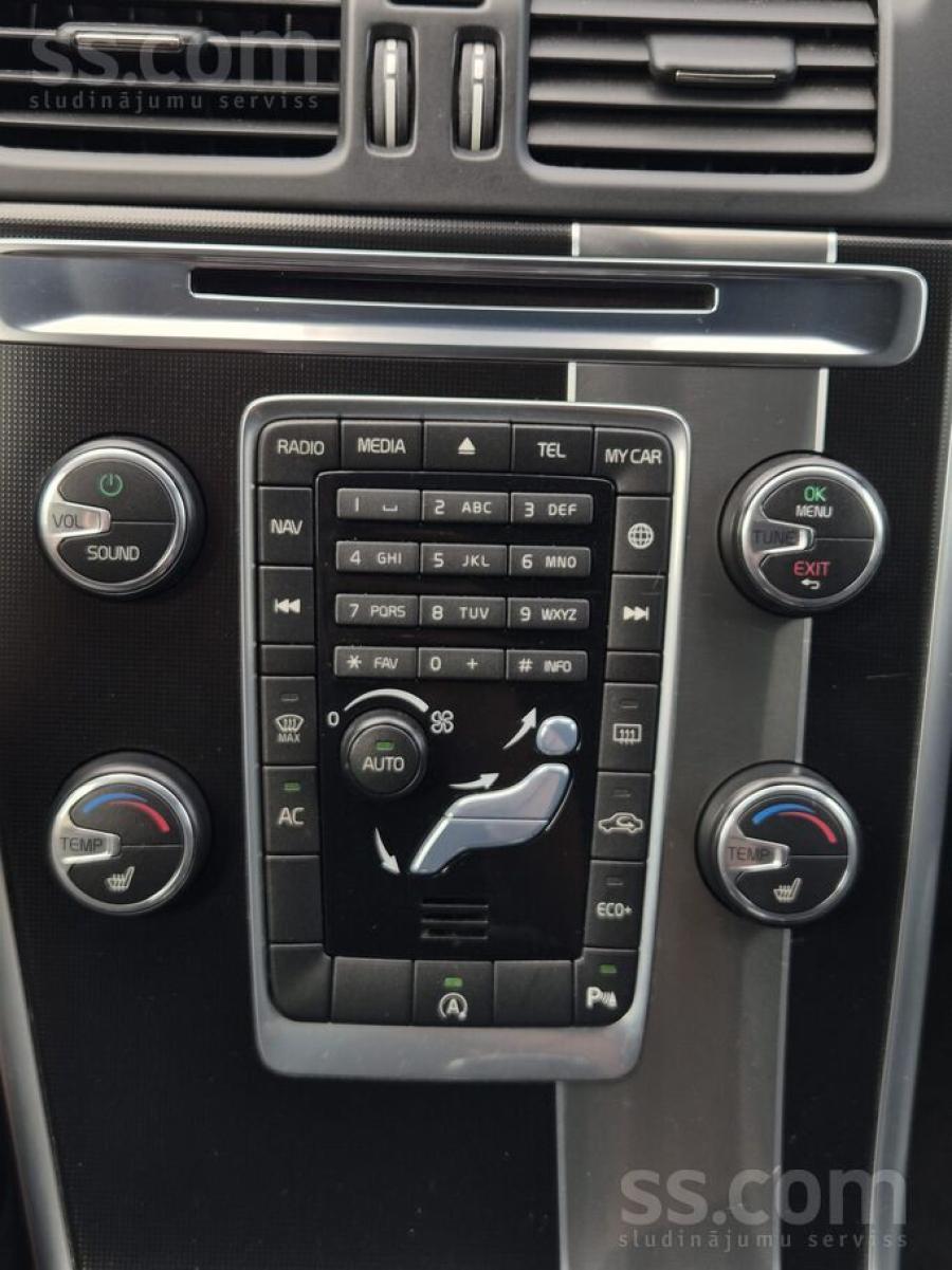 Grey Volvo XC60 2014 in Riga, with an engine capacity of 2.00 L and mileage of 316 thousand km for 8990 €, photo 18 on AUTOMOTO.COM.LV