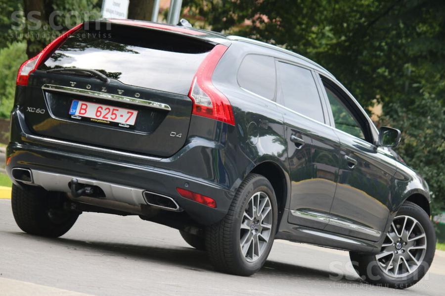 Grey Volvo XC60 2014 in Riga, with an engine capacity of 2.00 L and mileage of 255 thousand km for 10890 €, photo 3 on AUTOMOTO.COM.LV