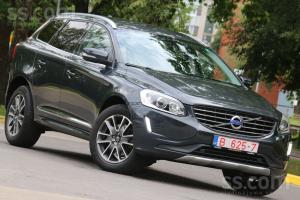 Grey Volvo XC60 2014 in Riga, with an engine capacity of 2.00 L and mileage of 255 thousand km for 10890 €, photo 4 on AUTOMOTO.COM.LV