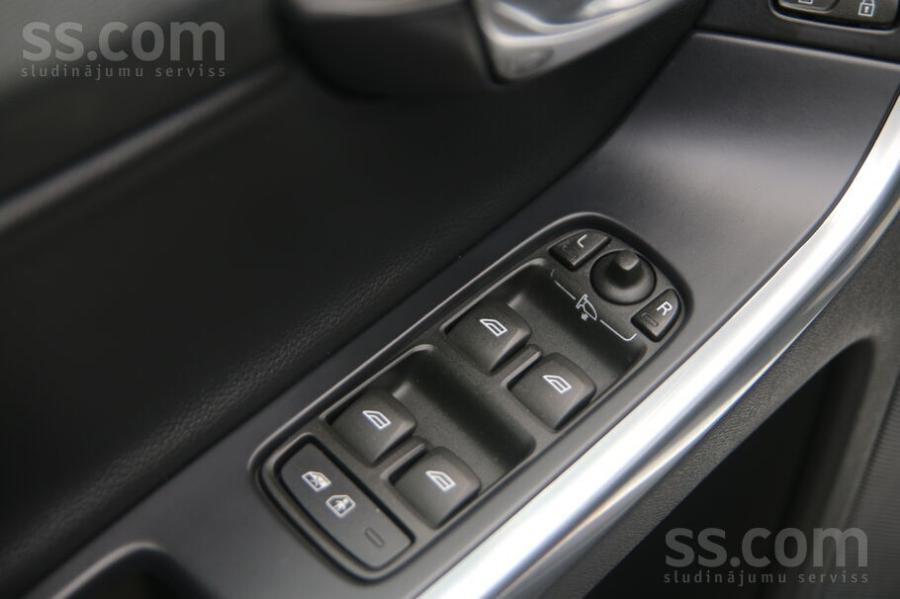 Grey Volvo XC60 2014 in Riga, with an engine capacity of 2.00 L and mileage of 255 thousand km for 10890 €, photo 8 on AUTOMOTO.COM.LV