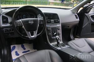 Grey Volvo XC60 2014 in Riga, with an engine capacity of 2.00 L and mileage of 255 thousand km for 10890 €, photo 10 on AUTOMOTO.COM.LV
