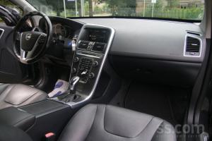 Grey Volvo XC60 2014 in Riga, with an engine capacity of 2.00 L and mileage of 255 thousand km for 10890 €, photo 12 on AUTOMOTO.COM.LV