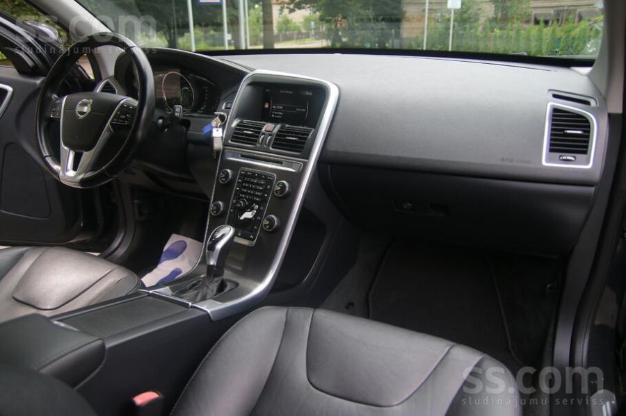 Grey Volvo XC60 2014 in Riga, with an engine capacity of 2.00 L and mileage of 255 thousand km for 10890 €, photo 12 on AUTOMOTO.COM.LV