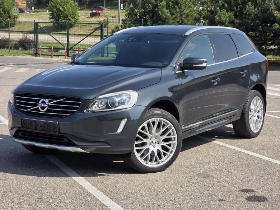 Grey Volvo XC60 2014 in Vilnius, with an engine capacity of 2.40 L and mileage of 203 thousand km for 15600 €, photo 4 on AUTOMOTO.COM.LV