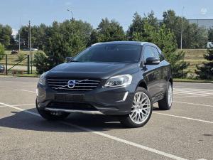 Grey Volvo XC60 2014 in Vilnius, with an engine capacity of 2.40 L and mileage of 203 thousand km for 15600 €, photo 5 on AUTOMOTO.COM.LV