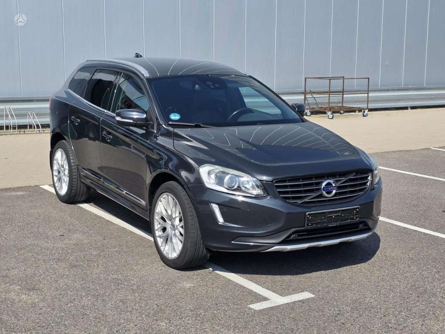 Grey Volvo XC60 2014 in Vilnius, with an engine capacity of 2.40 L and mileage of 203 thousand km for 15600 €, photo 8 on AUTOMOTO.COM.LV