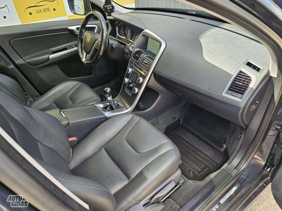 Grey Volvo XC60 2014 in Siauliai, with an engine capacity of 2.40 L and mileage of 262 thousand km for 13959 €, photo 13 on AUTOMOTO.COM.LV