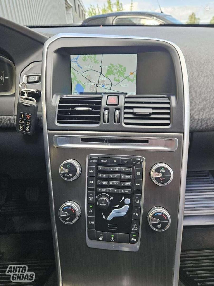 Grey Volvo XC60 2014 in Siauliai, with an engine capacity of 2.40 L and mileage of 262 thousand km for 13959 €, photo 18 on AUTOMOTO.COM.LV