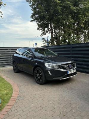 Grey Volvo XC60 2014 in Vilnius, with an engine capacity of 1.97 L and mileage of 323 thousand km for 10500 €, photo 13 on AUTOMOTO.COM.LV
