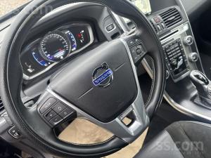 Grey Volvo XC60 2015 in Daugavpils, with an engine capacity of 2.40 L and mileage of 226 thousand km for 14200 €, photo 19 on AUTOMOTO.COM.LV