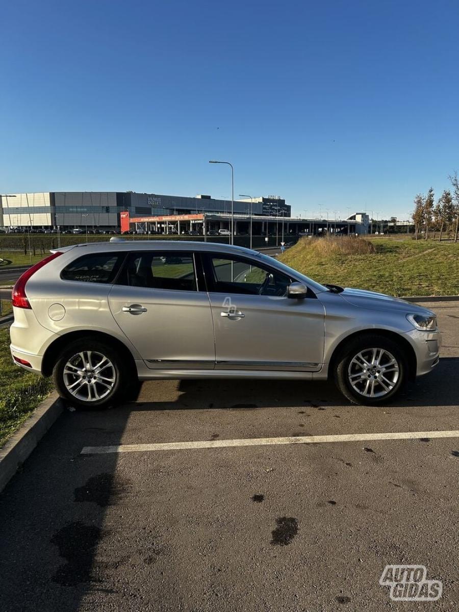 Grey Volvo XC60 2015 in Vilnius, with an engine capacity of 2.40 L and mileage of 255 thousand km for 11400 €, photo 4 on AUTOMOTO.COM.LV