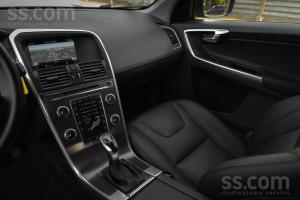 Grey Volvo XC60 2015 in Jelgava, with an engine capacity of 2.00 L and mileage of 235 thousand km for 11990 €, photo 15 on AUTOMOTO.COM.LV