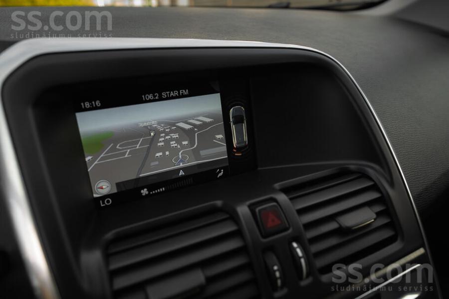 Grey Volvo XC60 2015 in Jelgava, with an engine capacity of 2.00 L and mileage of 235 thousand km for 11990 €, photo 18 on AUTOMOTO.COM.LV