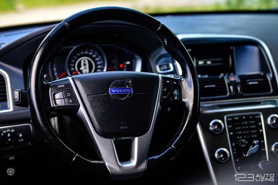 Grey Volvo XC60 2015 in Kretinga, with an engine capacity of 2.00 L and mileage of 262 thousand km for 12250 €, photo 16 on AUTOMOTO.COM.LV
