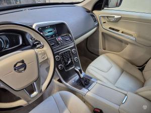 Grey Volvo XC60 2015 in Raseiniai, with an engine capacity of 1.97 L and mileage of 249 thousand km for 9300 €, photo 12 on AUTOMOTO.COM.LV