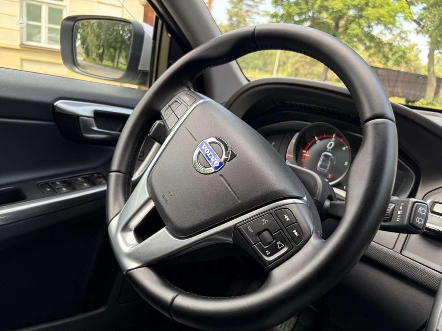 Grey Volvo XC60 2015 in Utena, with an engine capacity of 2.00 L and mileage of 226 thousand km for 11700 €, photo 16 on AUTOMOTO.COM.LV