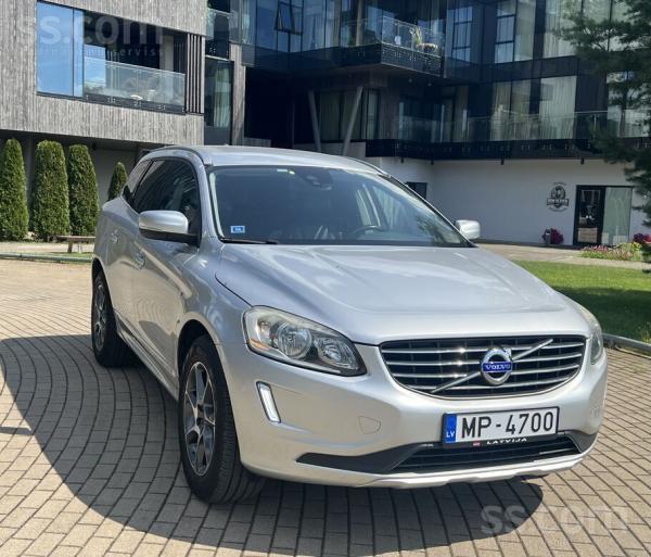 Grey Volvo XC60 2015 in Riga, with an engine capacity of 2.00 L and mileage of 219 thousand km for 13100 €, photo 1 on AUTOMOTO.COM.LV