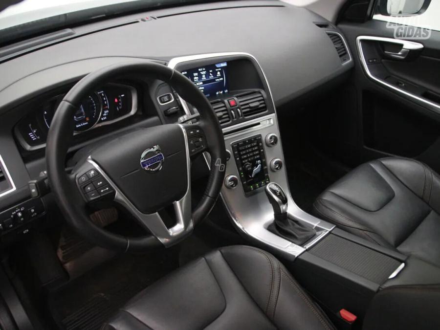 Grey Volvo XC60 2016 in Vilnius, with an engine capacity of 2.00 L and mileage of 220 thousand km for 15599 €, photo 17 on AUTOMOTO.COM.LV