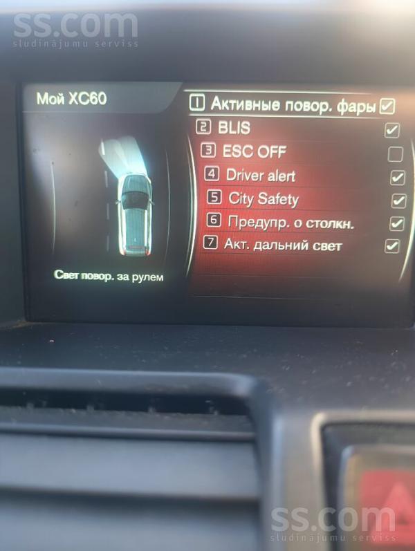 Grey Volvo XC60 2016 in Riga, with an engine capacity of 2.40 L and mileage of 243 thousand km for 14000 €, photo 6 on AUTOMOTO.COM.LV