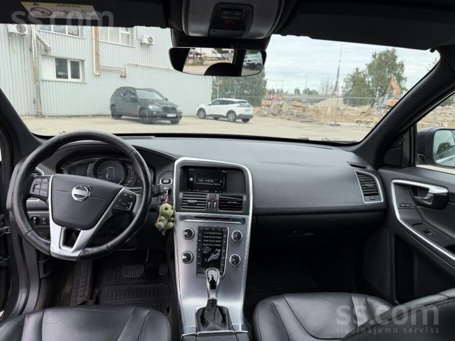 Grey Volvo XC60 2016 in Riga, with an engine capacity of 2.00 L and mileage of 189 thousand km for 10000 €, photo 14 on AUTOMOTO.COM.LV