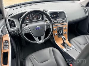 Grey Volvo XC60 2016 in Riga, with an engine capacity of 2.40 L and mileage of 195 thousand km for 15995 €, photo 15 on AUTOMOTO.COM.LV