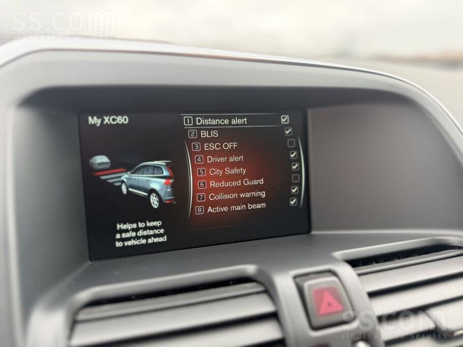 Grey Volvo XC60 2016 in Riga, with an engine capacity of 2.40 L and mileage of 195 thousand km for 15995 €, photo 23 on AUTOMOTO.COM.LV