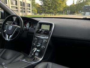 Grey Volvo XC60 2016 in Taurage, with an engine capacity of 2.40 L and mileage of 325 thousand km for 11450 €, photo 23 on AUTOMOTO.COM.LV