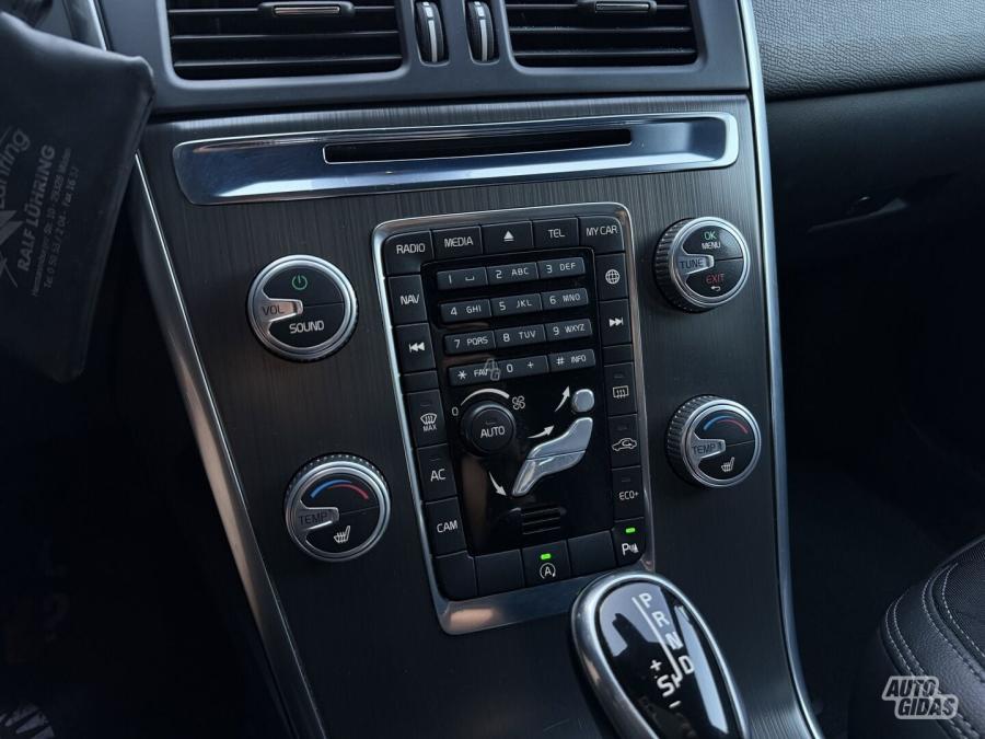 Grey Volvo XC60 2016 in Kretinga, with an engine capacity of 2.00 L and mileage of 216 thousand km for 11999 €, photo 13 on AUTOMOTO.COM.LV
