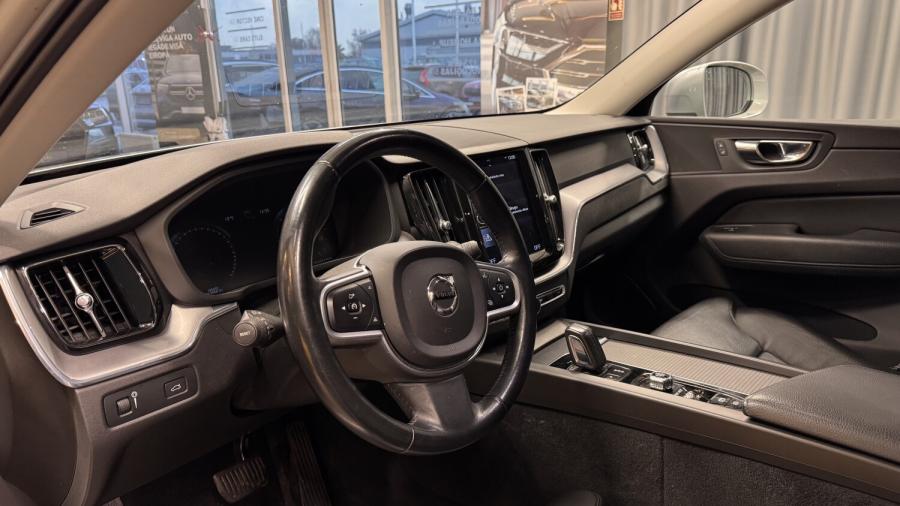 Grey Volvo XC60 2020 in Riga, with an engine capacity of 2.00 L and mileage of 165 thousand km for 23990 €, photo 9 on AUTOMOTO.COM.LV