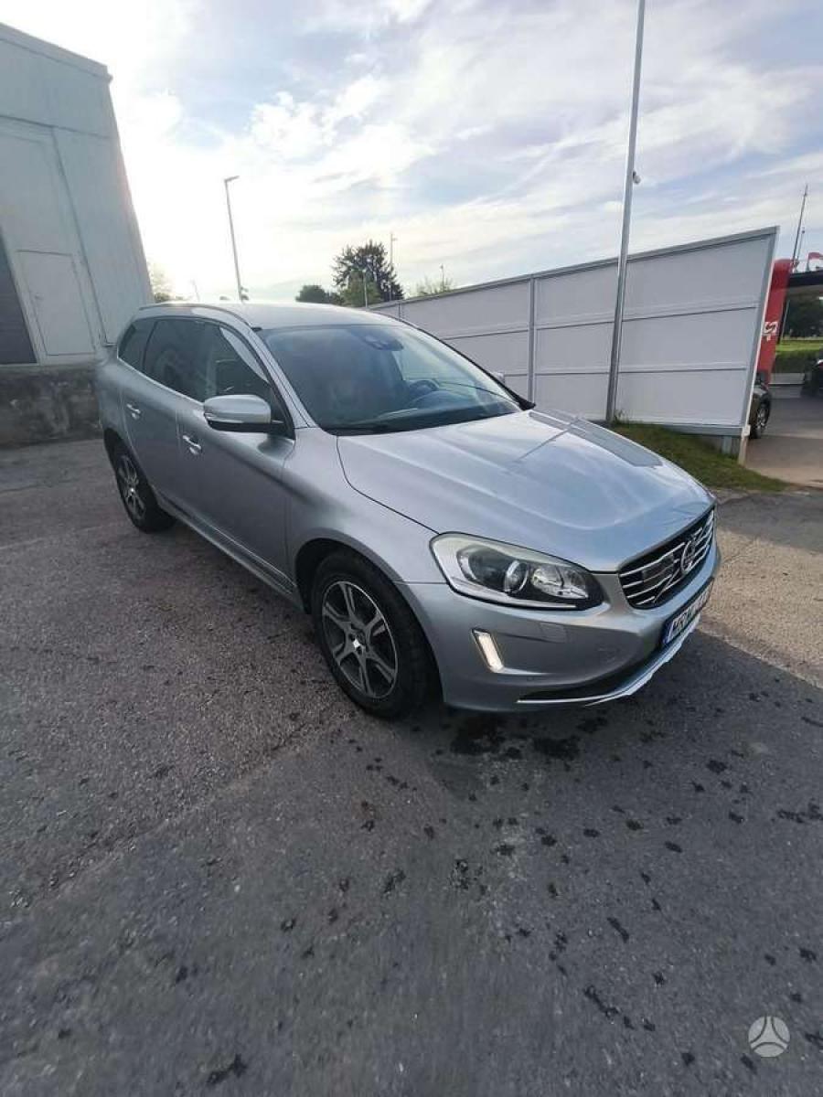 Grey Volvo XC60 2014 in Alytus, with an engine capacity of 2.40 L and mileage of 270 thousand km for 9990 €, photo 1 on AUTOMOTO.COM.LV