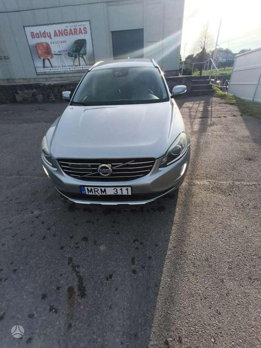 Grey Volvo XC60 2014 in Alytus, with an engine capacity of 2.40 L and mileage of 270 thousand km for 9990 €, photo 3 on AUTOMOTO.COM.LV