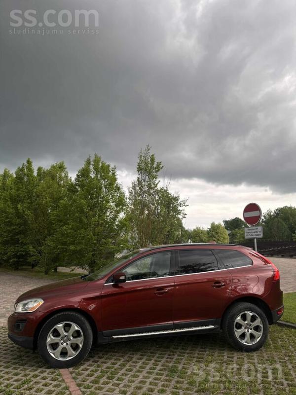 Sarkans Volvo XC60 2009 Jelgava, ar dzinēja tilpumu 2.40 L un nobraukumu 294 tūkst. km par 9650 €, foto 1 vietnē AUTOMOTO.COM.LV