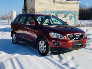 Sarkans Volvo XC60 2009 Kauņa, ar dzinēja tilpumu 2.40 L un nobraukumu 290 tūkst. km par 7690 €, foto  vietnē AUTOMOTO.COM.LV