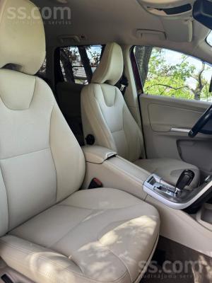 Red Volvo XC60 2009 in Cesis, with an engine capacity of 2.40 L and mileage of 300 thousand km for 7400 €, photo 6 on AUTOMOTO.COM.LV