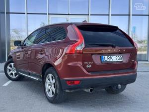 Red Volvo XC60 2010 in Vilnius, with an engine capacity of 2.40 L and mileage of 277 thousand km for 6800 €, photo 5 on AUTOMOTO.COM.LV