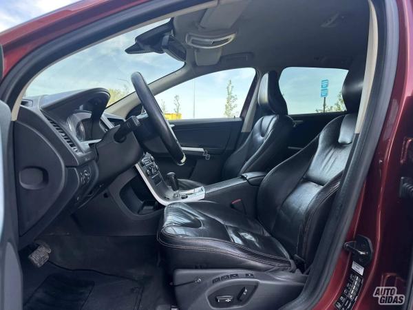 Red Volvo XC60 2010 in Vilnius, with an engine capacity of 2.40 L and mileage of 277 thousand km for 6800 €, photo 7 on AUTOMOTO.COM.LV