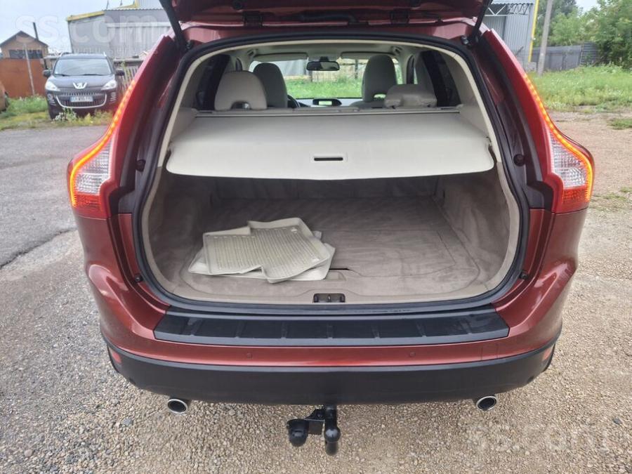 Red Volvo XC60 2010 in Riga, with an engine capacity of 2.40 L and mileage of 306 thousand km for 8495 €, photo 12 on AUTOMOTO.COM.LV