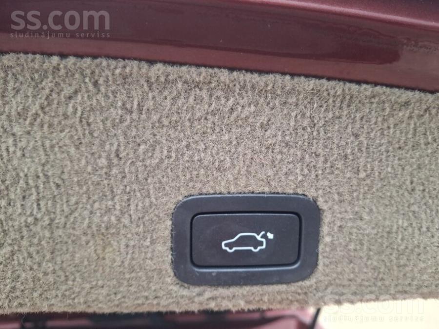 Red Volvo XC60 2010 in Riga, with an engine capacity of 2.40 L and mileage of 306 thousand km for 8495 €, photo 13 on AUTOMOTO.COM.LV